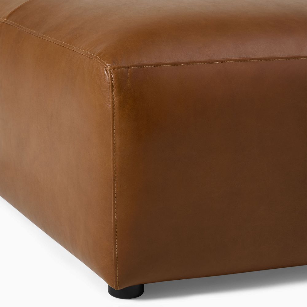 Leo Motion Leather Ottoman | West Elm