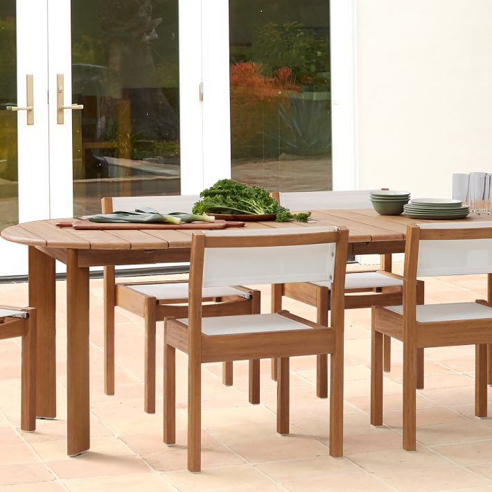 Round Expandable Dining Room Table