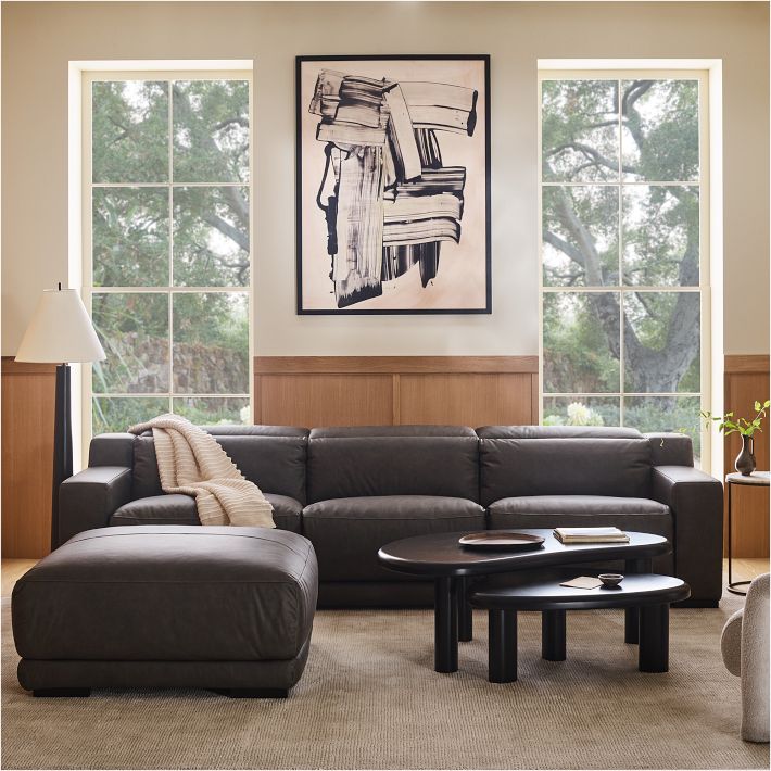 Dalton Motion Leather Ottoman | West Elm