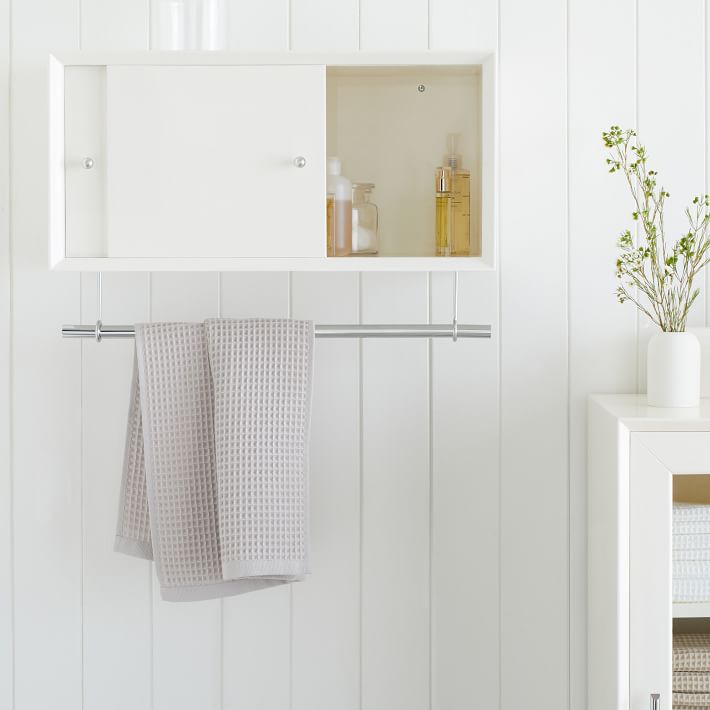 White bathroom cabinet with towel bar store