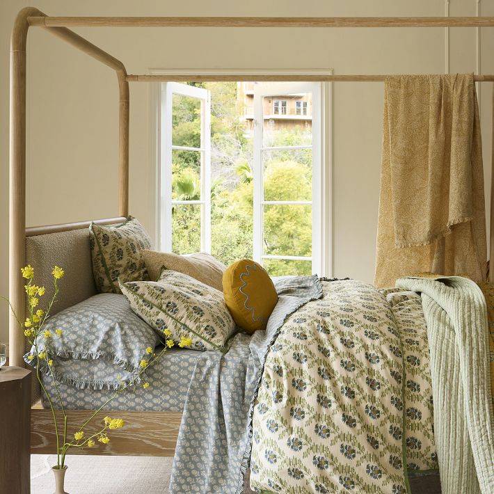Yellow canopy bed store