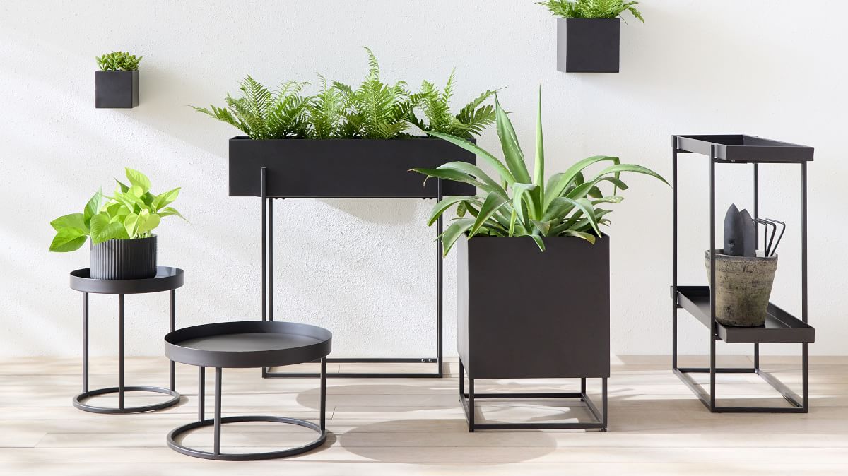 Black metal plant table store