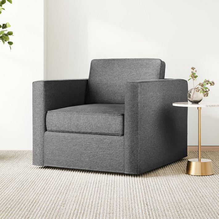 Swivel slipcovered armchair store
