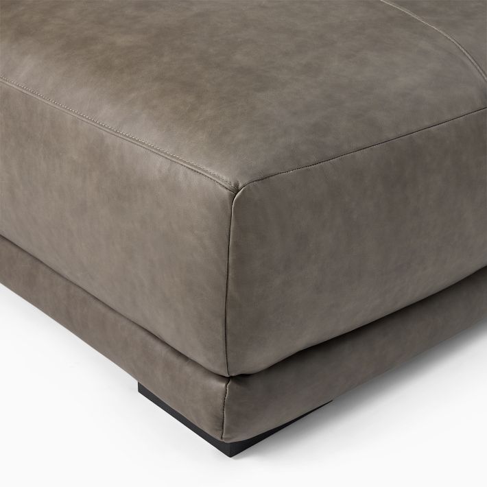 Dalton Motion Leather Ottoman | West Elm