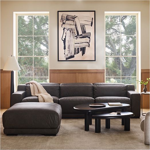 Dalton Motion Leather Ottoman | West Elm
