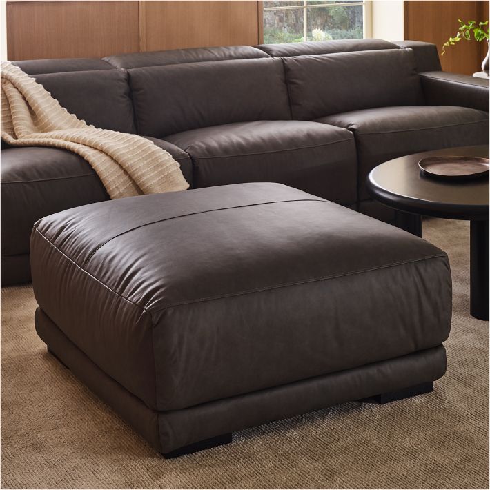 Dalton Motion Leather Ottoman West Elm